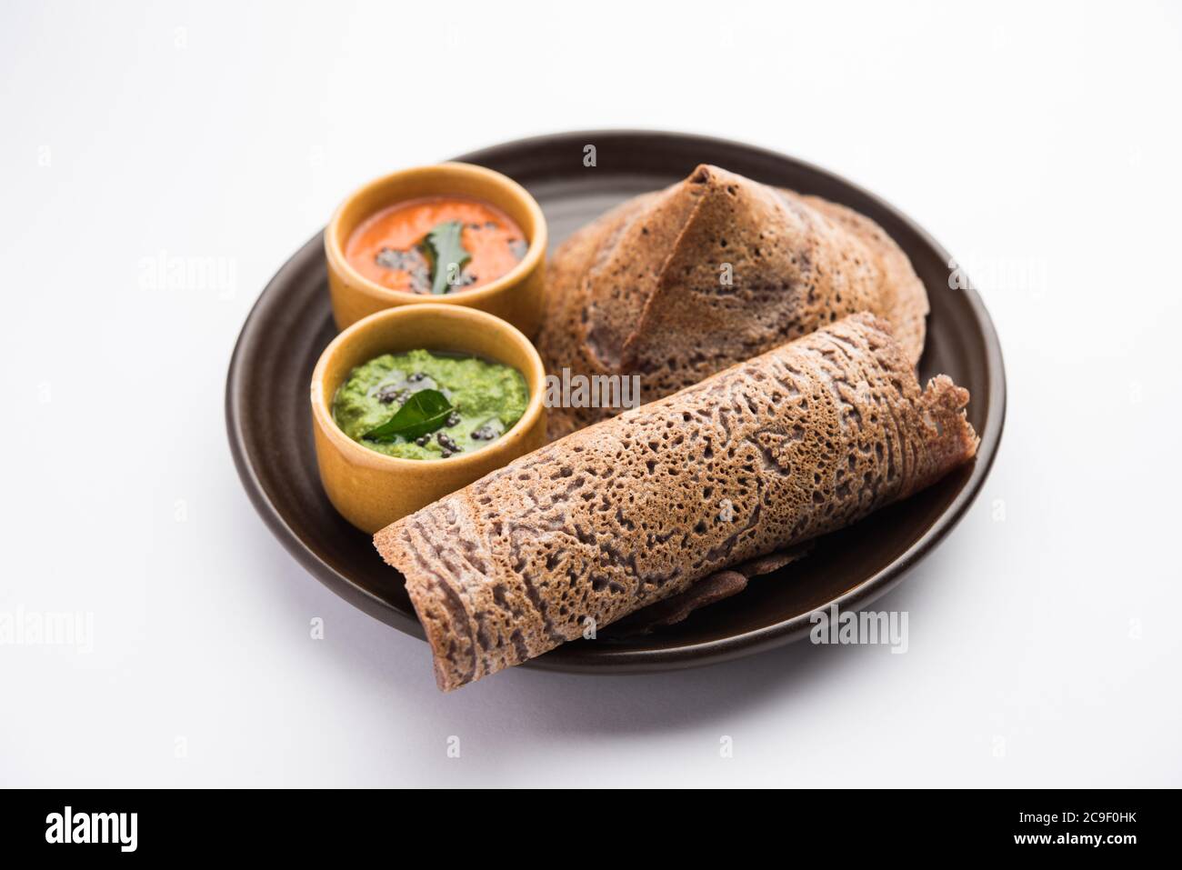 Finger Millet or Ragi Dosa is a healthy Indian breakfast served with ...