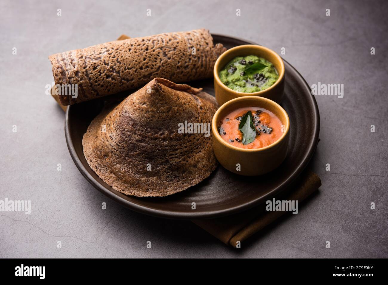 Finger Millet or Ragi Dosa is a healthy Indian breakfast served with ...