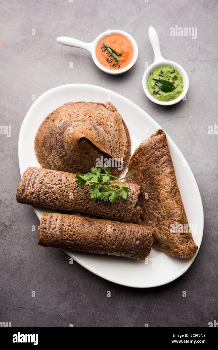 Finger Millet or Ragi Dosa is a healthy Indian breakfast served with ...