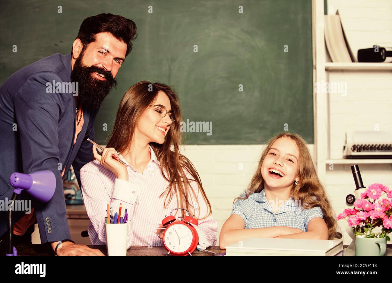 Tutor for excellence. Extra classes. Gifted child. Little girl studying ...