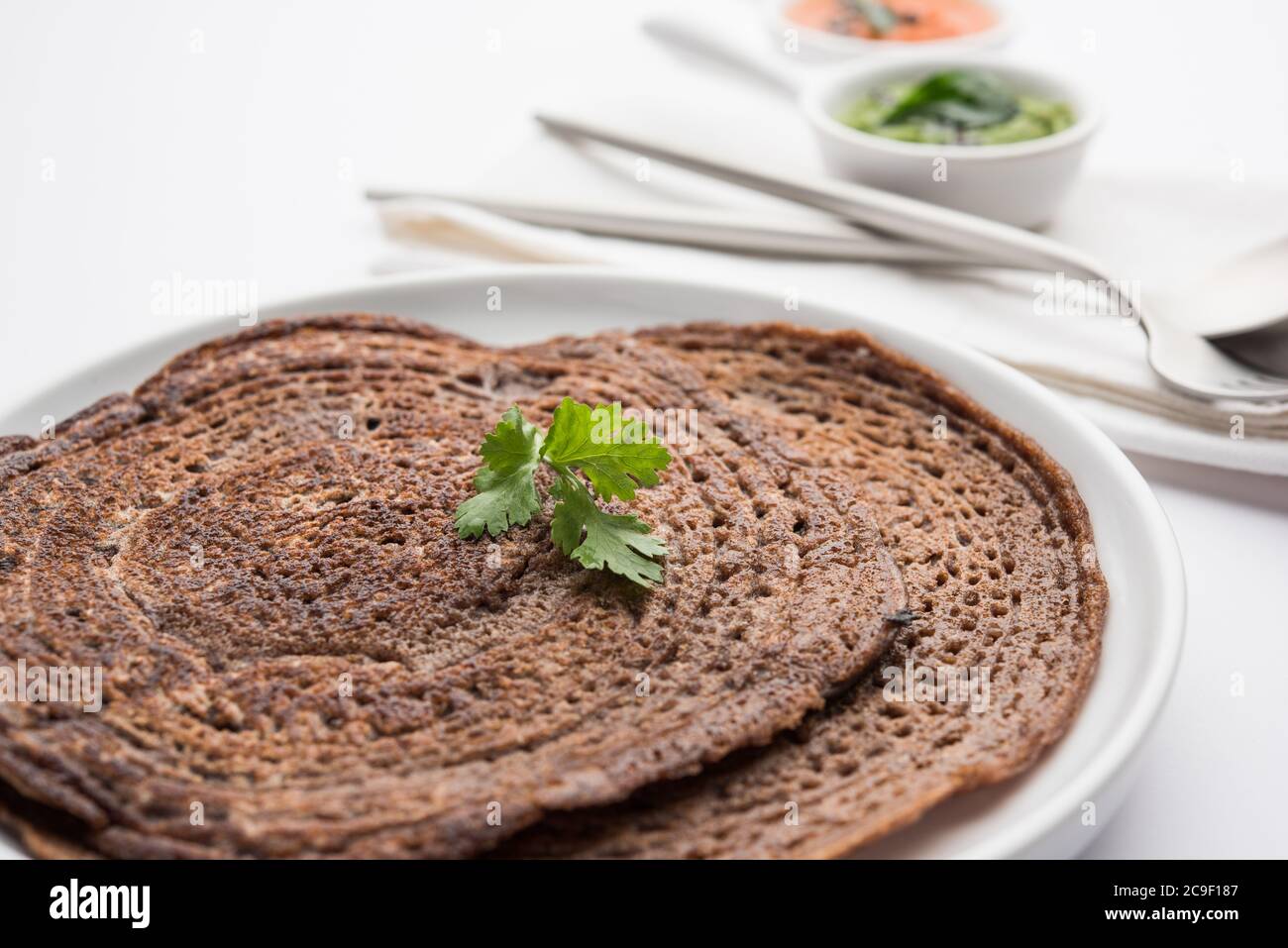 Finger Millet or Ragi Dosa is a healthy Indian breakfast served with ...
