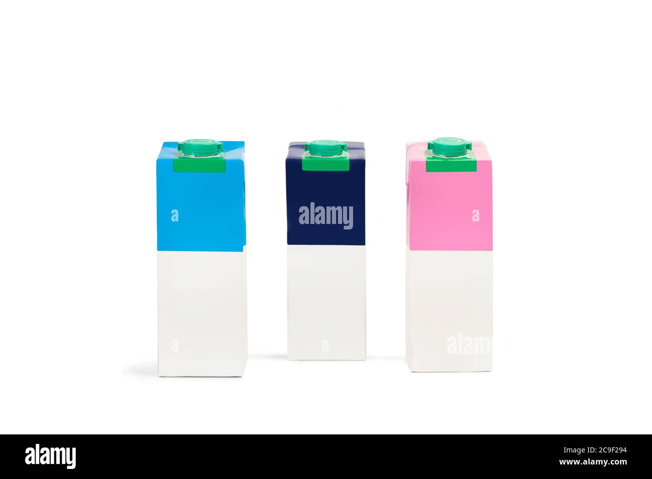 Three milk bricks isolated on a white background Stock Photo - Alamy