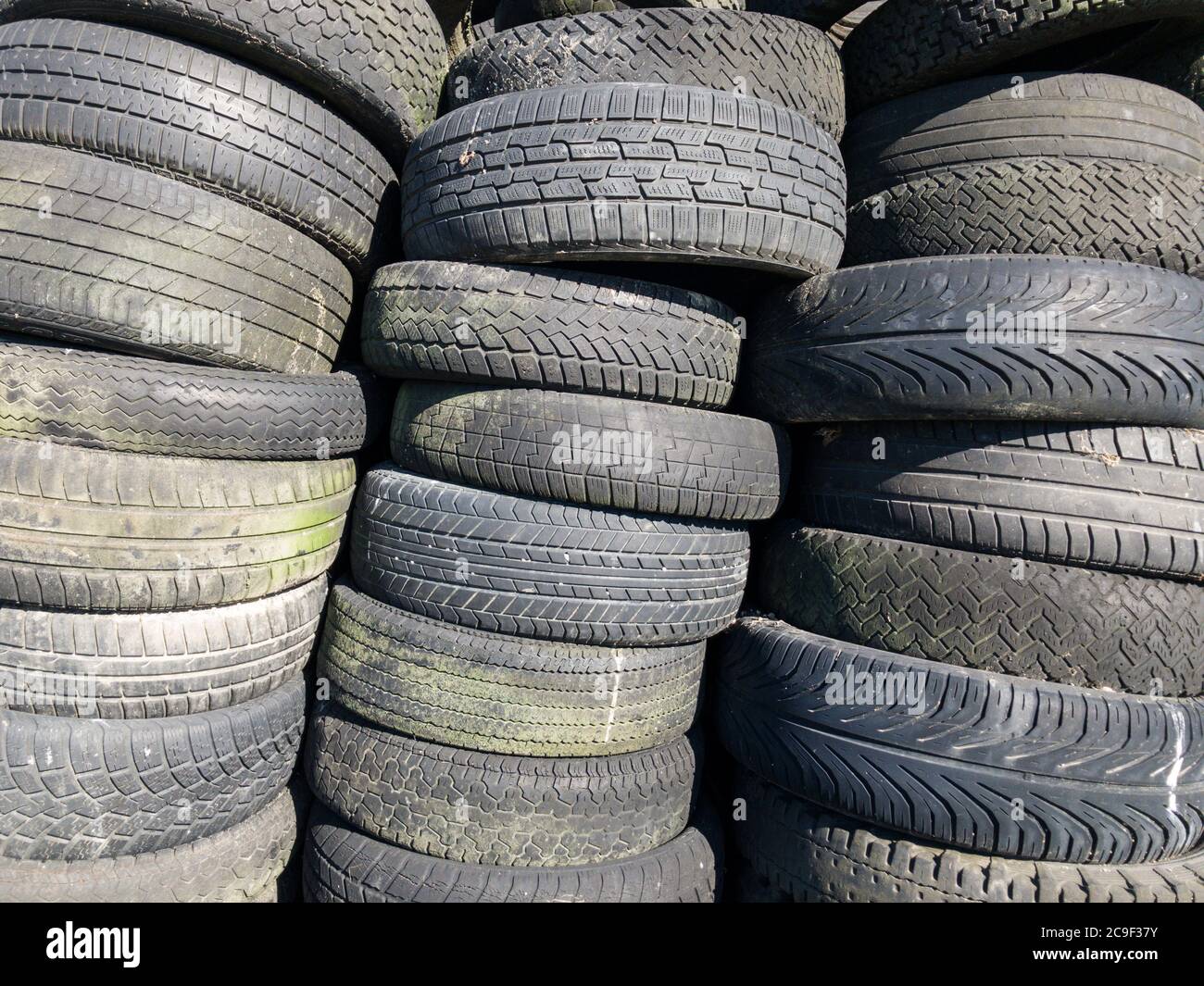 Piles of car tires hi-res stock photography and images - Alamy