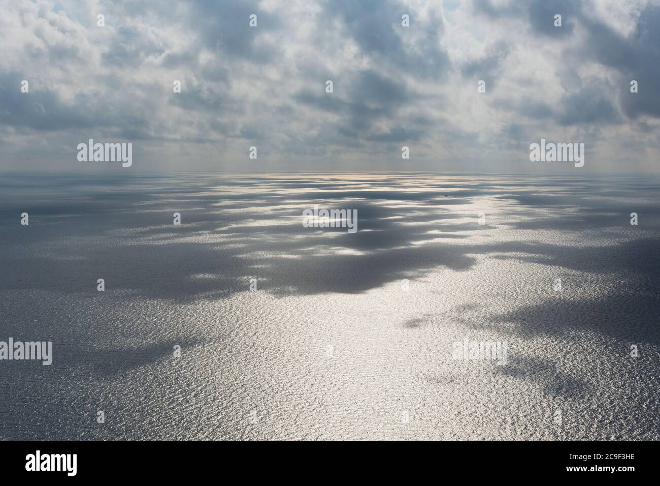 Gray beautiful clouds over the sea. Long panoramic sea autumn view. Low ...