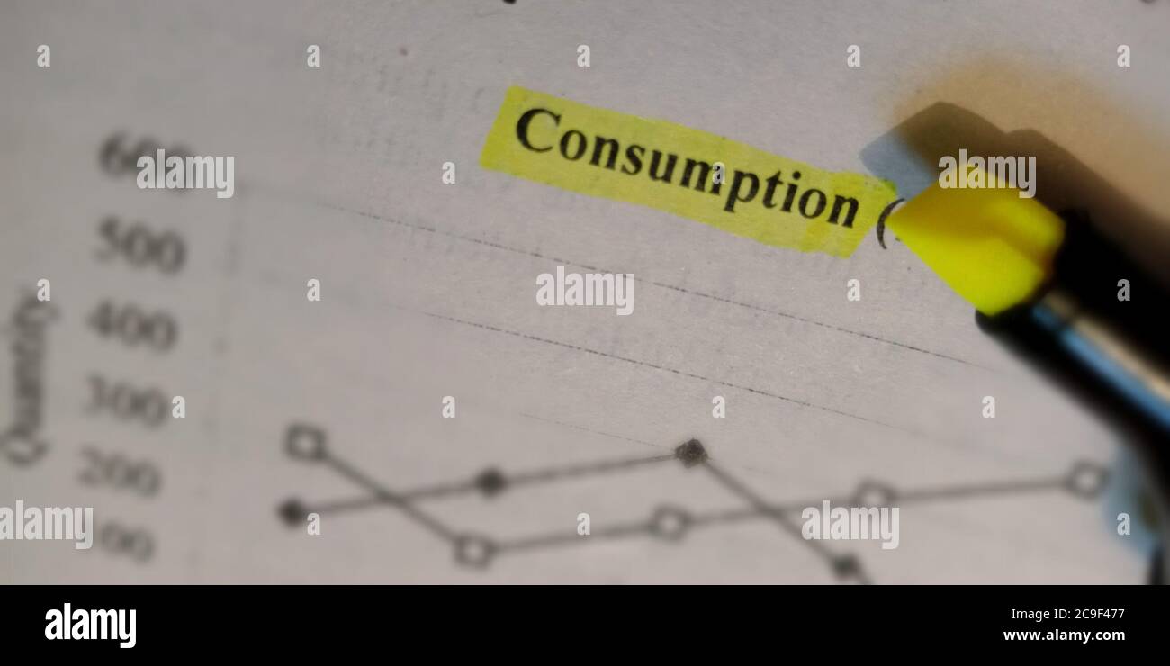 Consumption business terminology presented on book text highlighted ...
