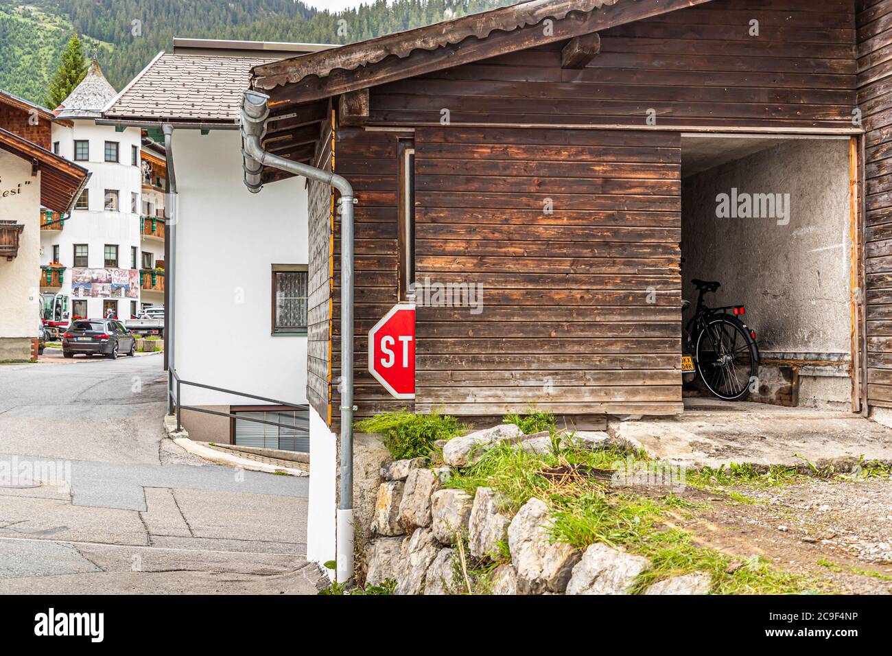 Stop Traffic sign is only half to be seen in Berwang, Austria Stock ...