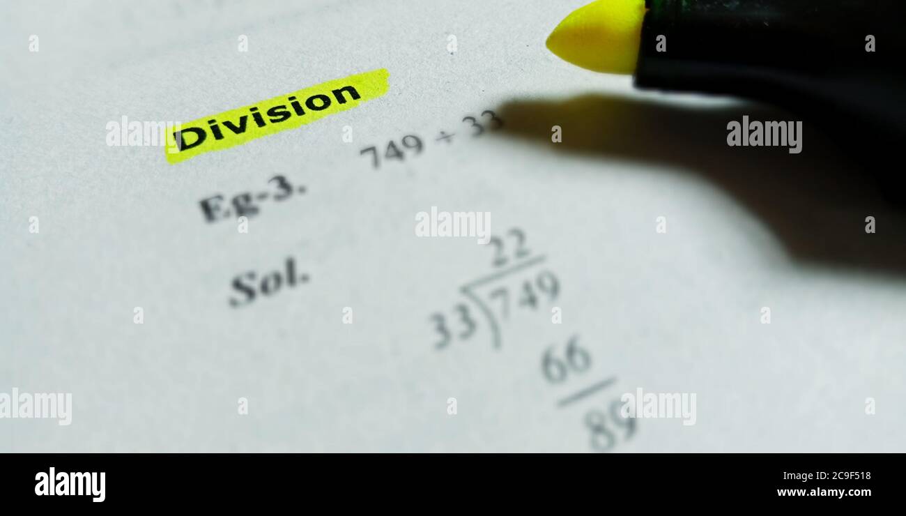 Division mathematical terminology presented on book text highlighted ...