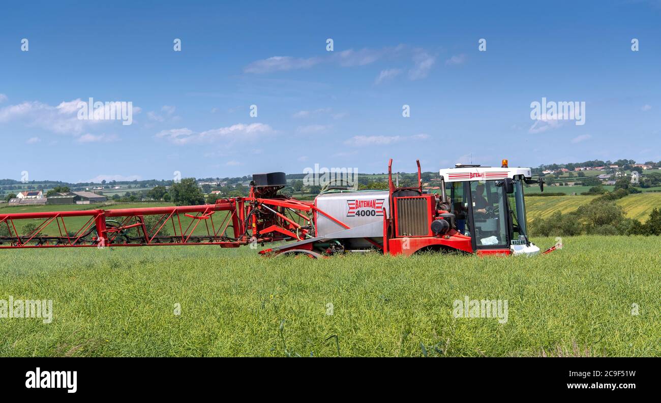 Bateman 4000 self propelled sprayer applying herbicide to crop of ...