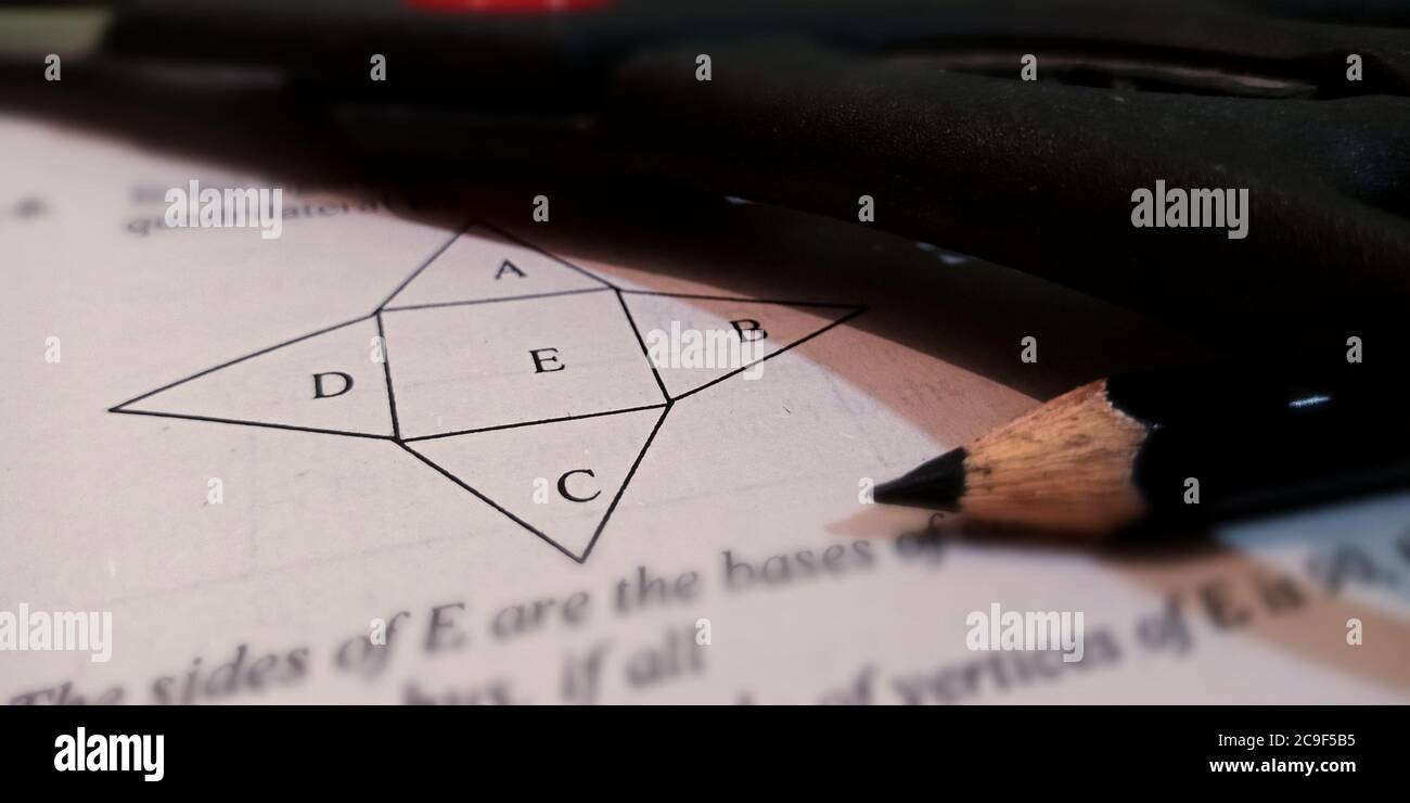 trigonometry shaped maths educational text displayed on paper in ...