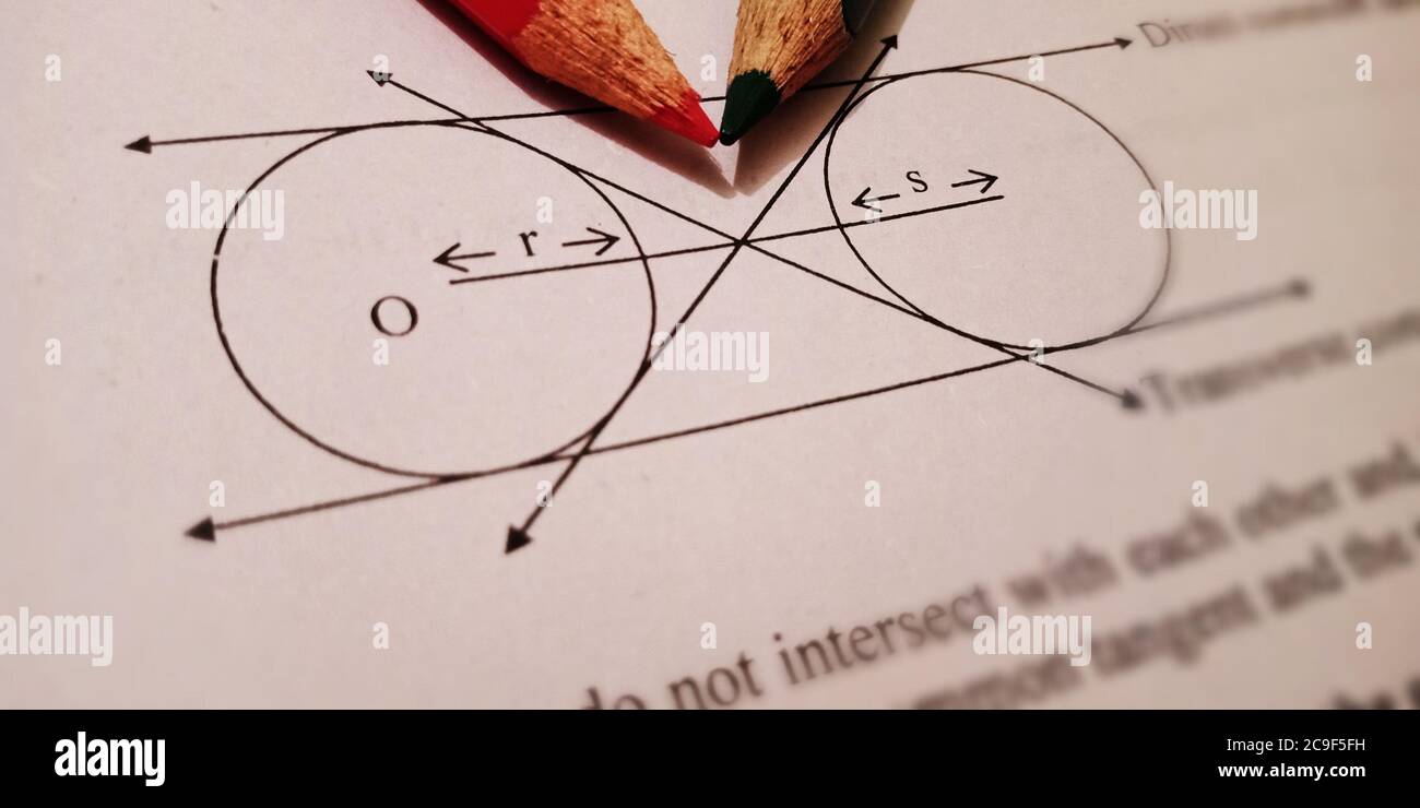 Circle with pencil pointer maths educational text displayed on paper in ...