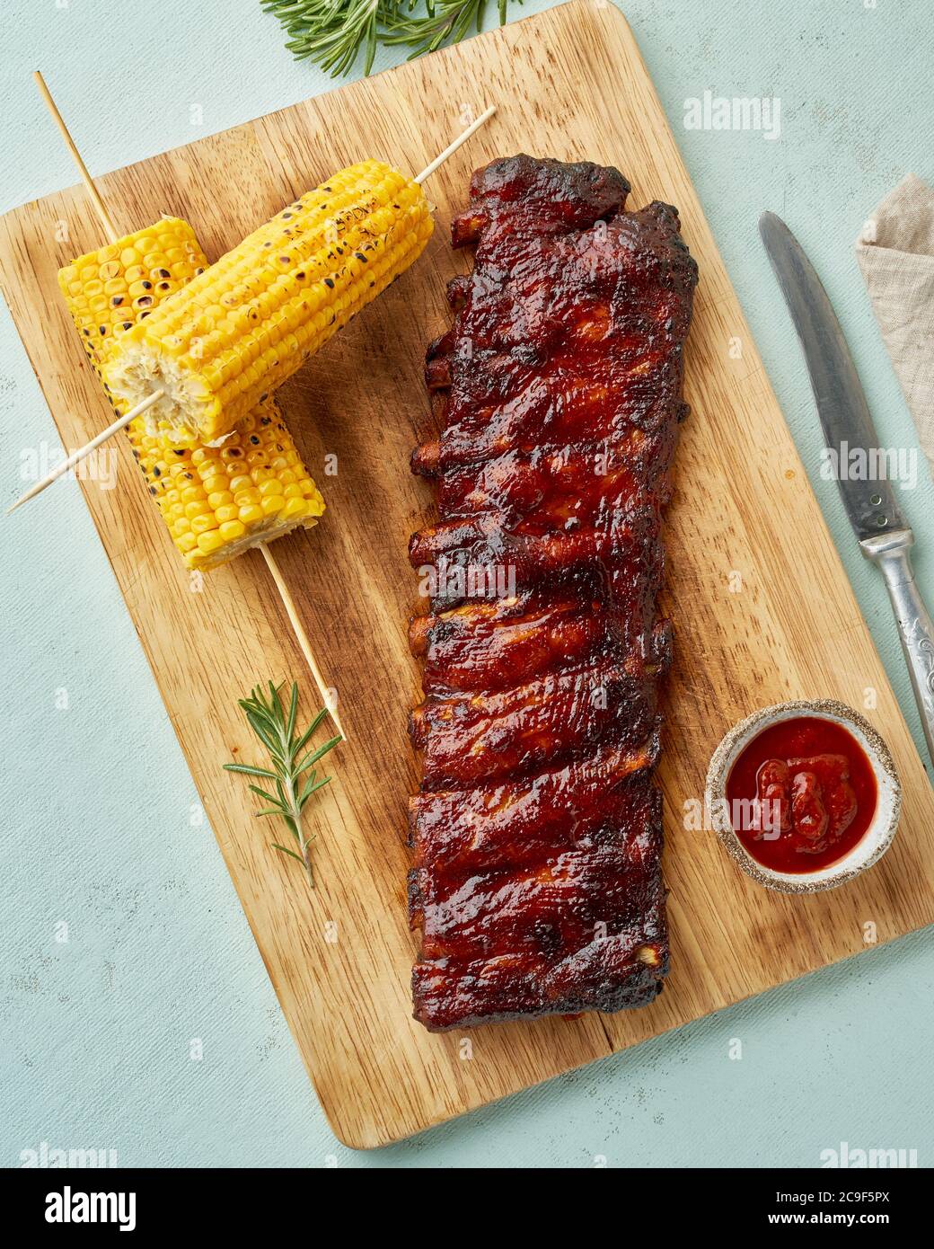Barbecue pork ribs. Slow cooking recipe. Whole pickled roasted pork ...