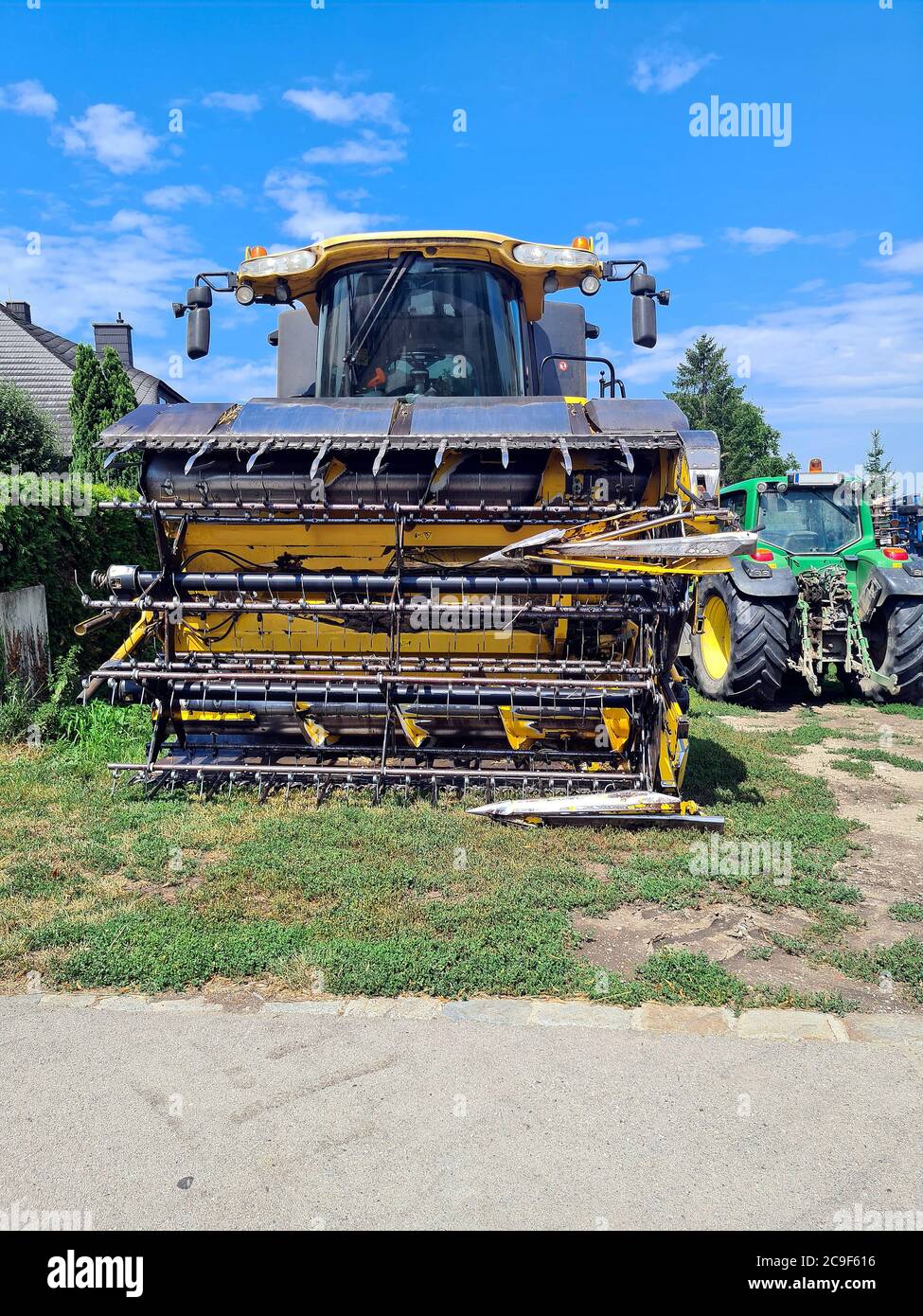 Austria, combine harvester and tractor, a modern agricultural equipment ...