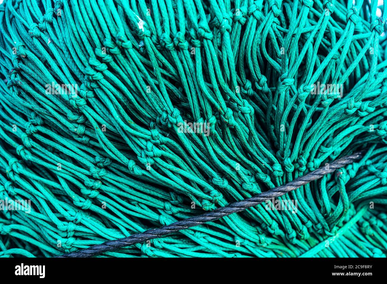 Lots of fishing nets as abstract background in the small trading port ...