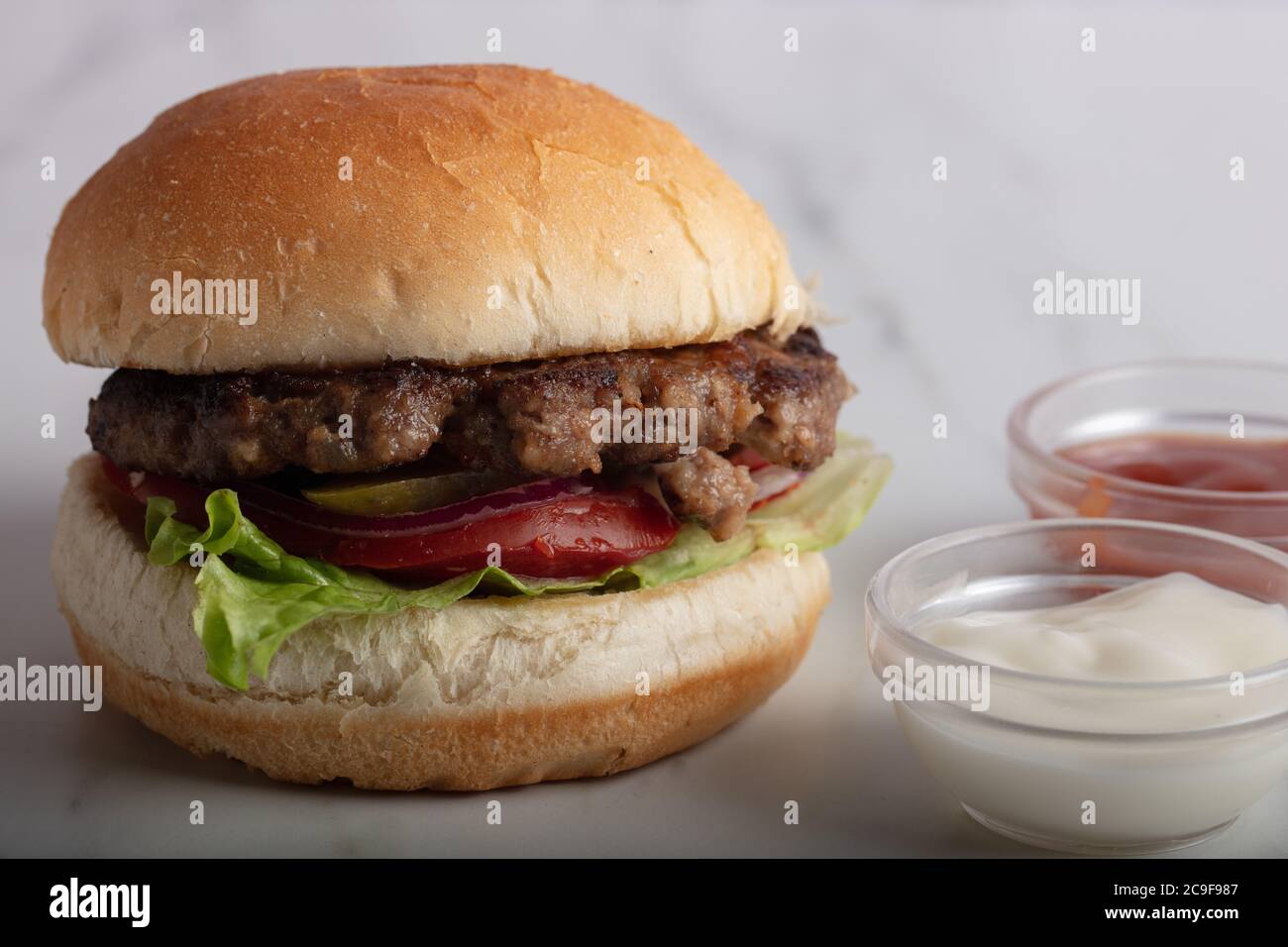 Perfect hamburger classic burger , tomato and lettuce isolated on a ...
