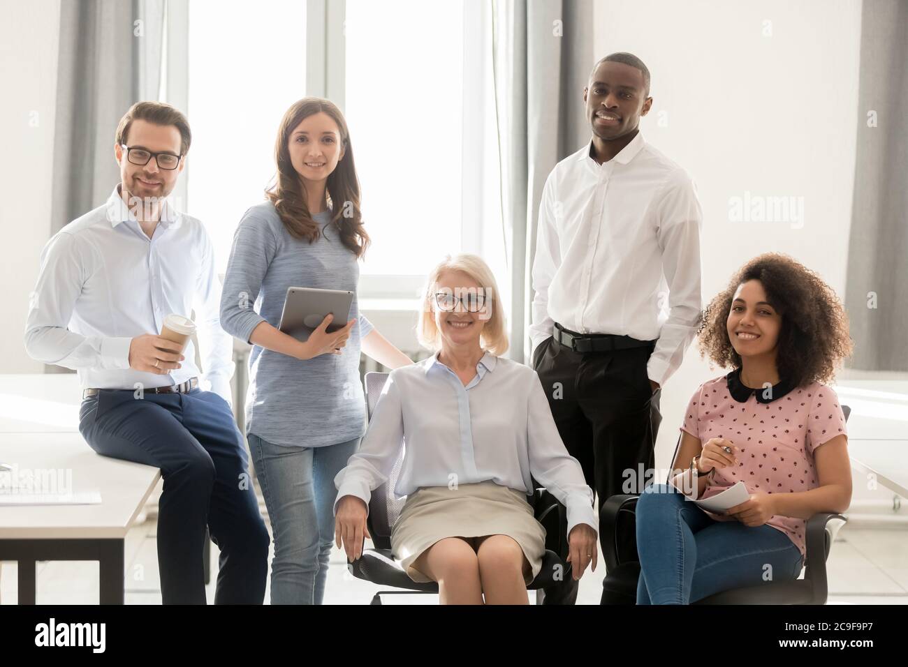 Happy smiling businesswoman look camera hi-res stock photography and ...