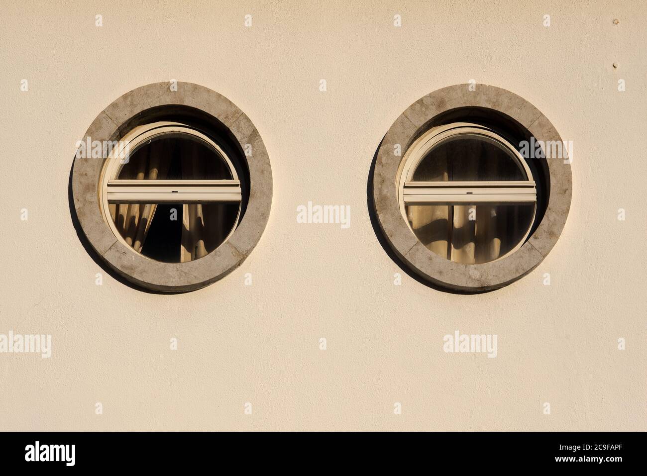 Architectural detail close-up of 2 circular round concrete frame ...