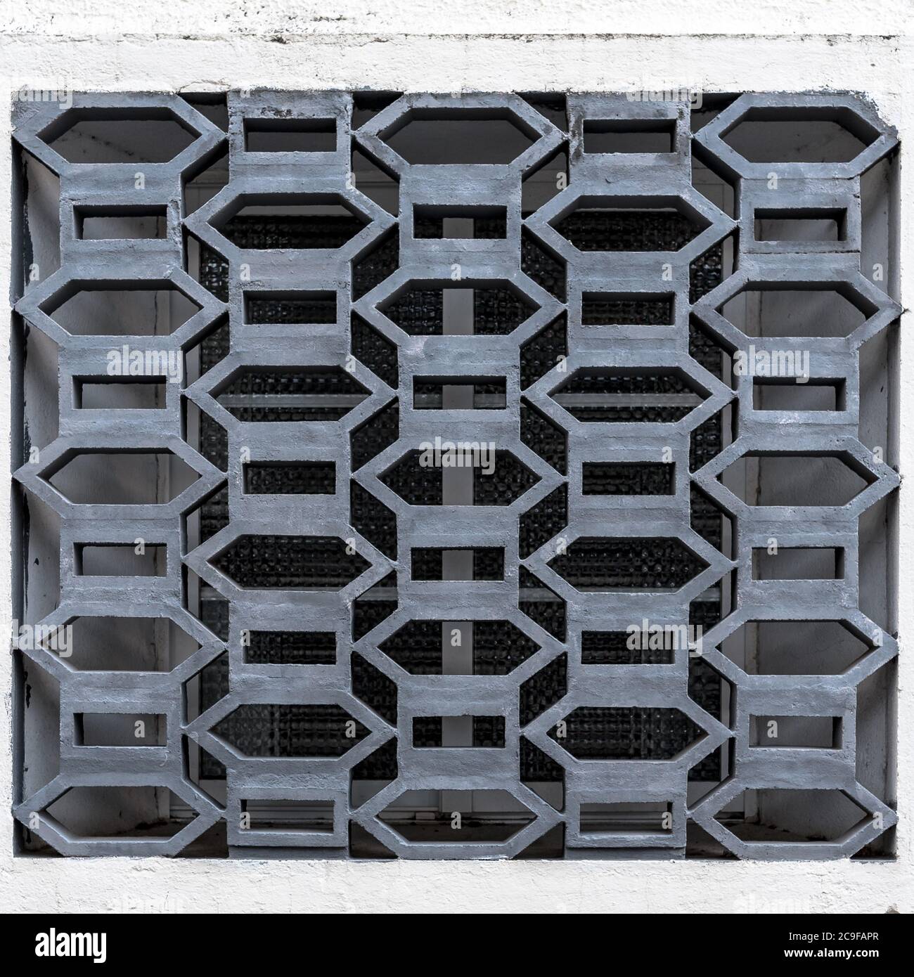 Architectural detail close-up of decorative pattern black concrete bars ...