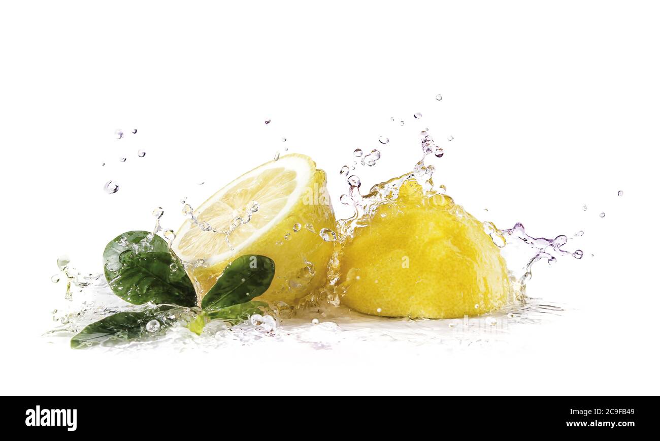 Water splash on lemon Stock Photo - Alamy