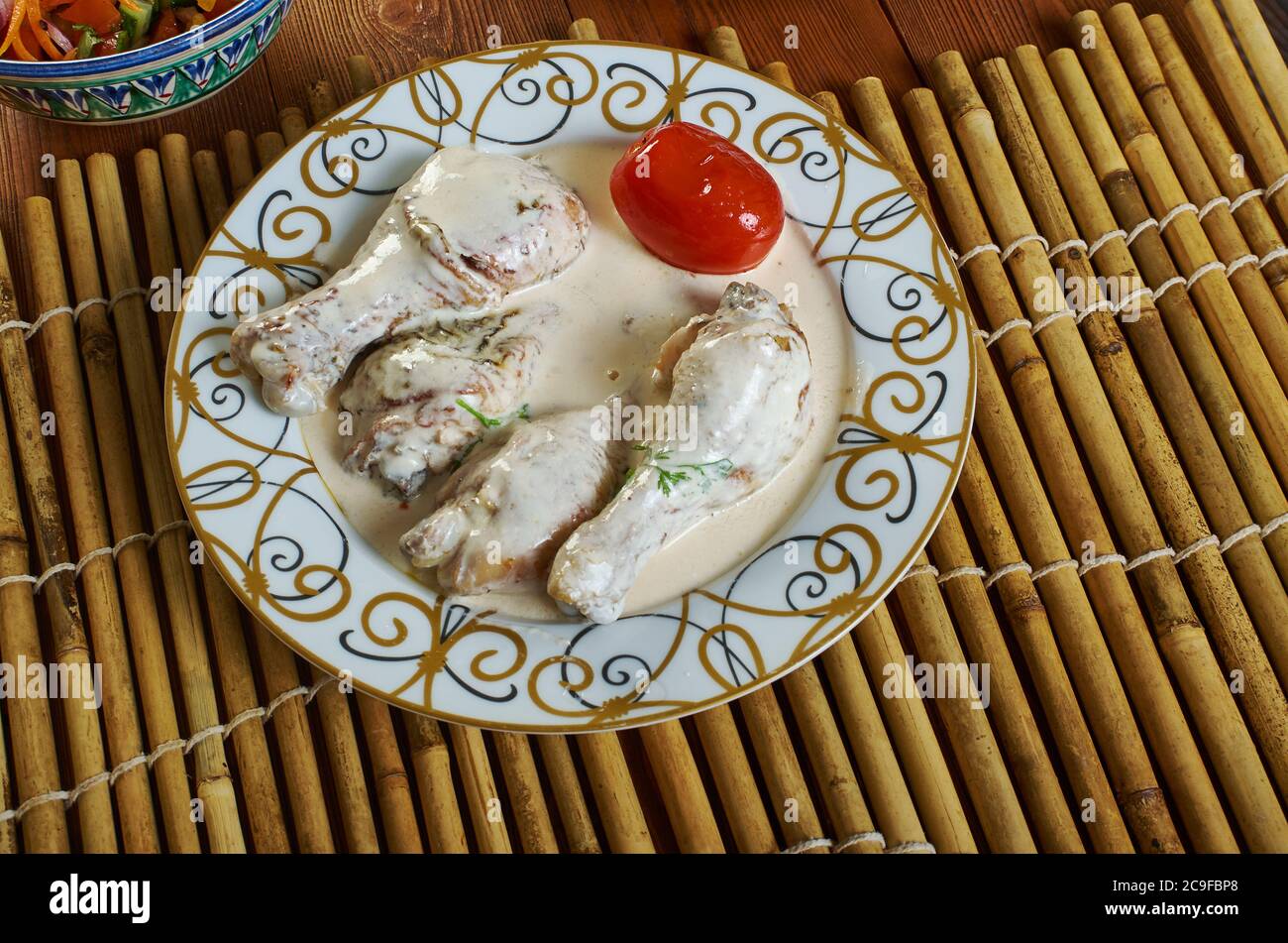 Chkmeruli - traditional Georgian dish of chicken in garlic sauce Stock ...