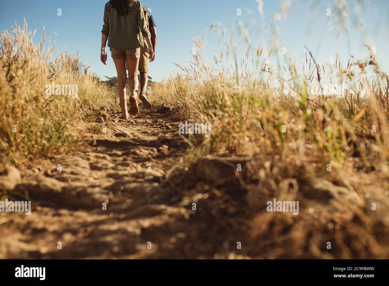 People walking up a hill hi-res stock photography and images - Alamy