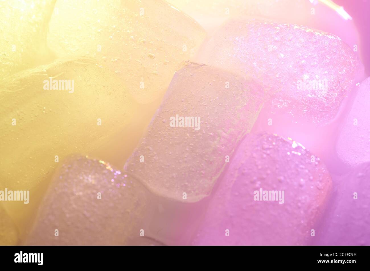 Vibrant color ice cubes macro close up view. Abstract frozen background Stock Photo - Alamy