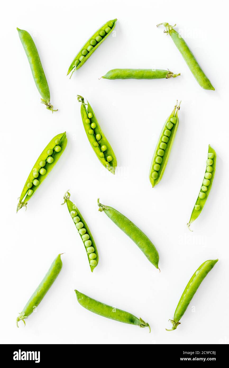 Set of green pea pods isolated on white background Stock Photo - Alamy