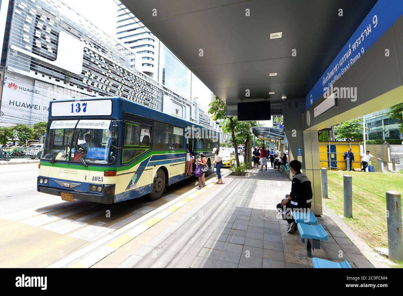 Bangkok, Thailand. 31st July, 2020. Passengers wait at a smart bus stop ...