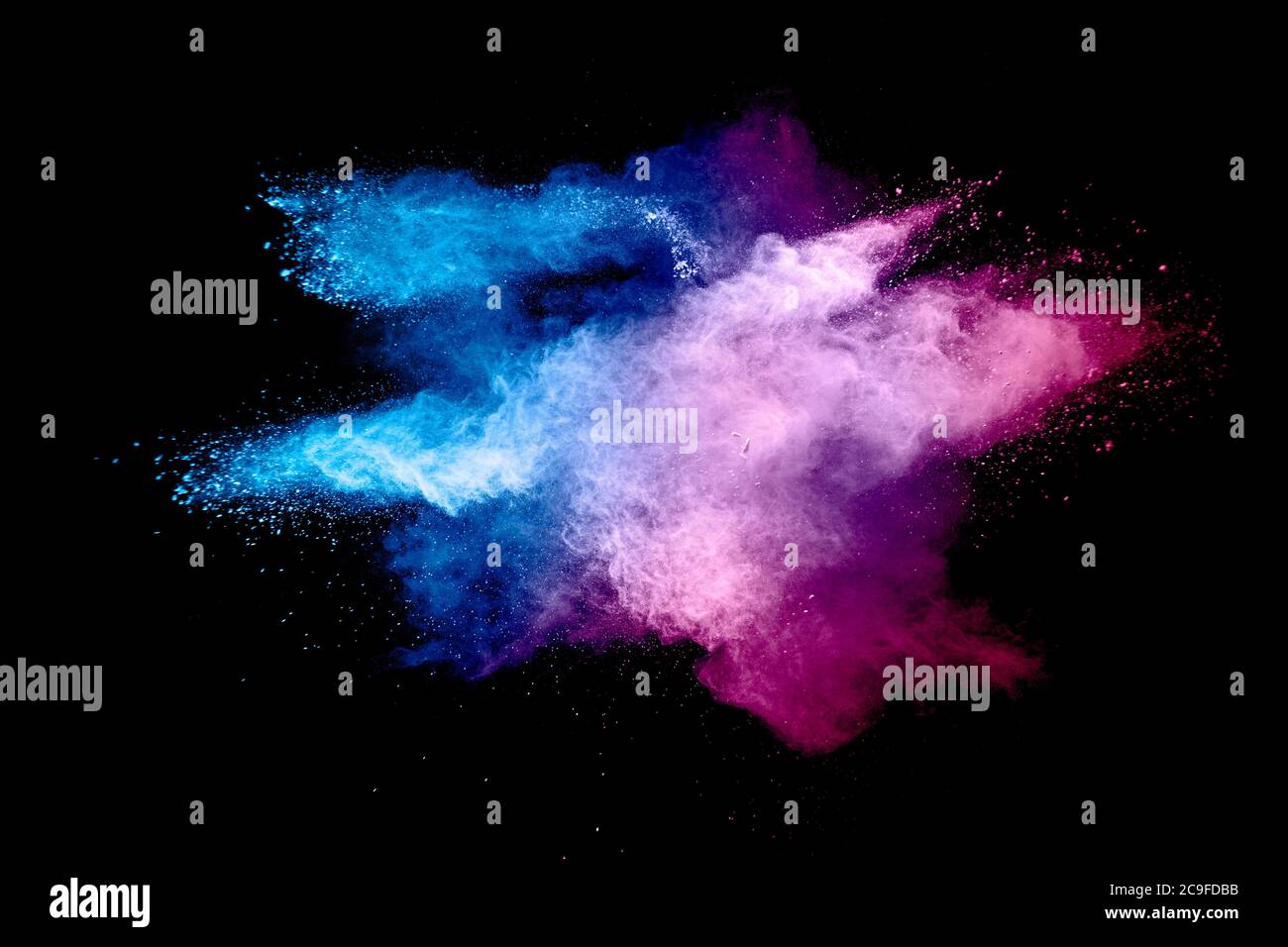 Abstract blue pink powder explosion on white background. Closeup of ...