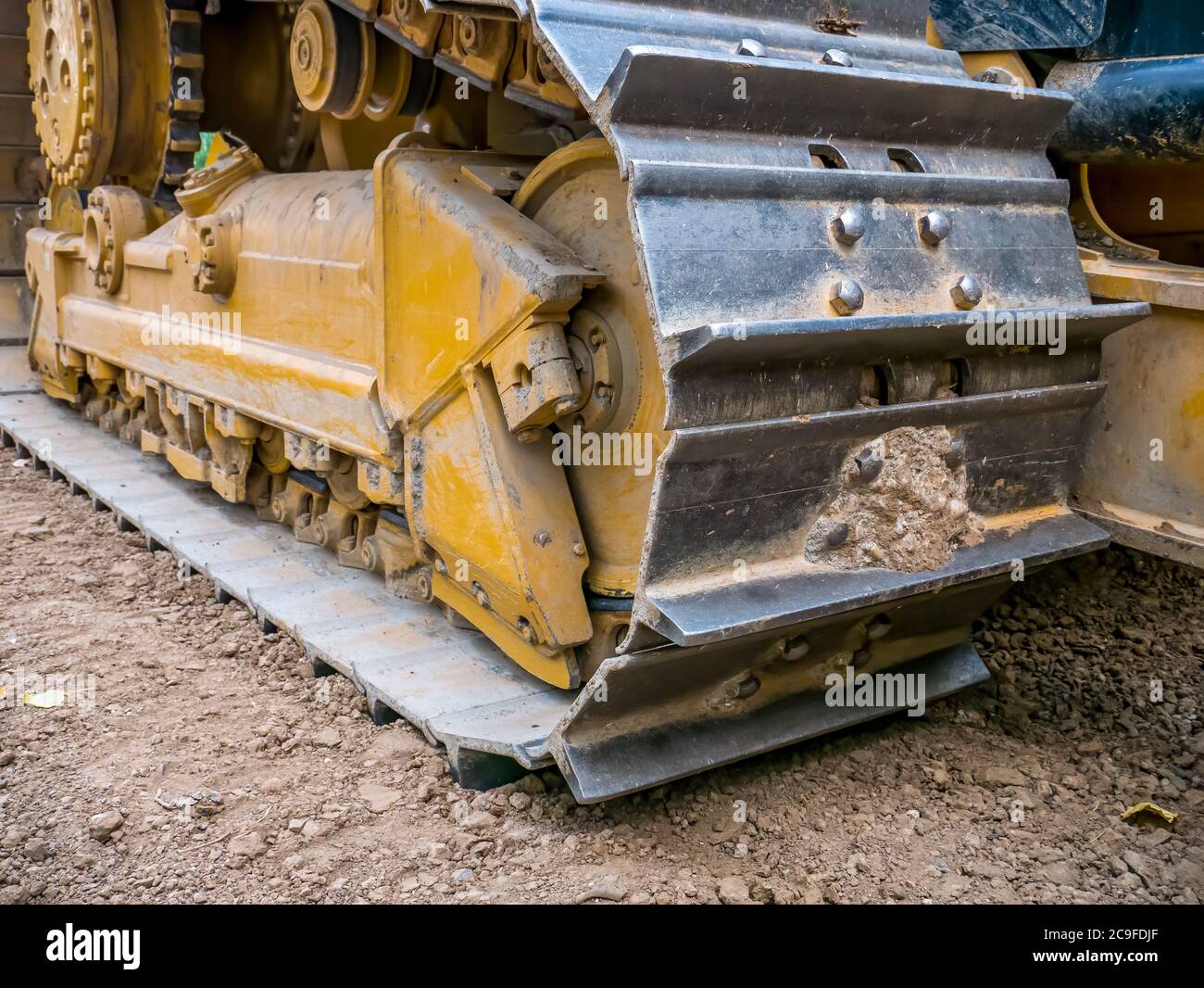 Close up detail with chain tracks of a bulldozer Stock Photo - Alamy
