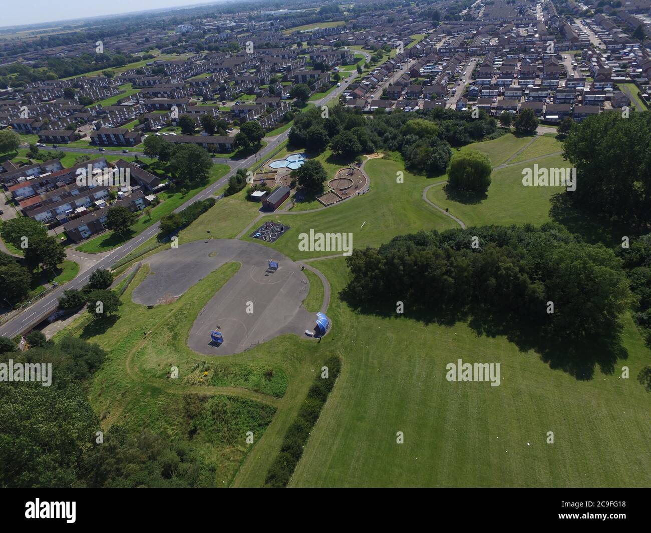 Playing fields houses hi-res stock photography and images - Alamy