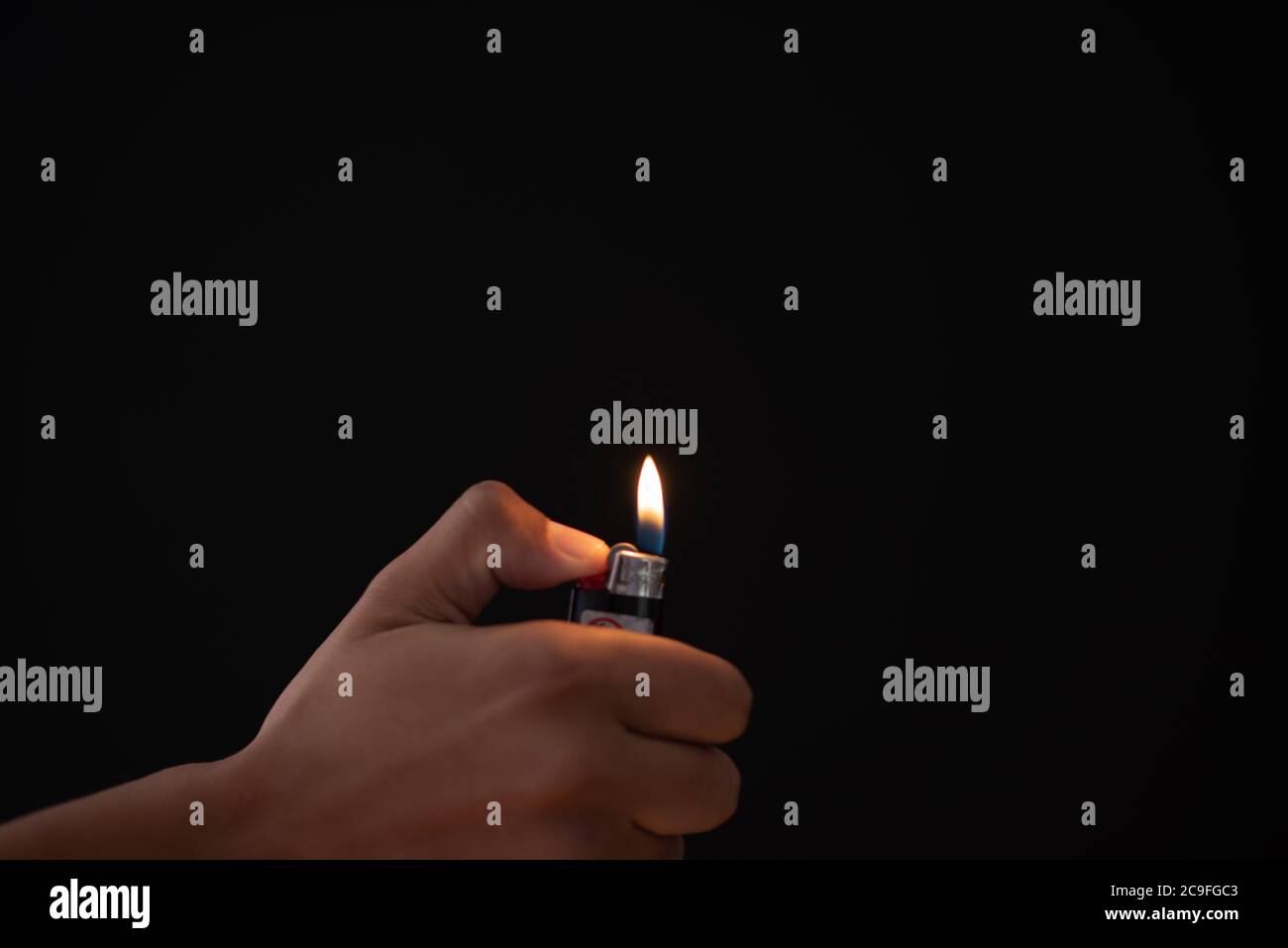Hand Holding Lighter High Resolution Stock Photography and Images - Alamy