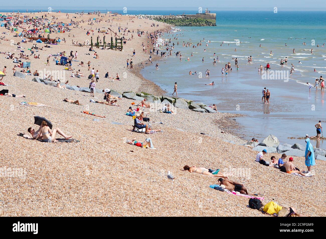 Hastings beach swimmers hi-res stock photography and images - Alamy
