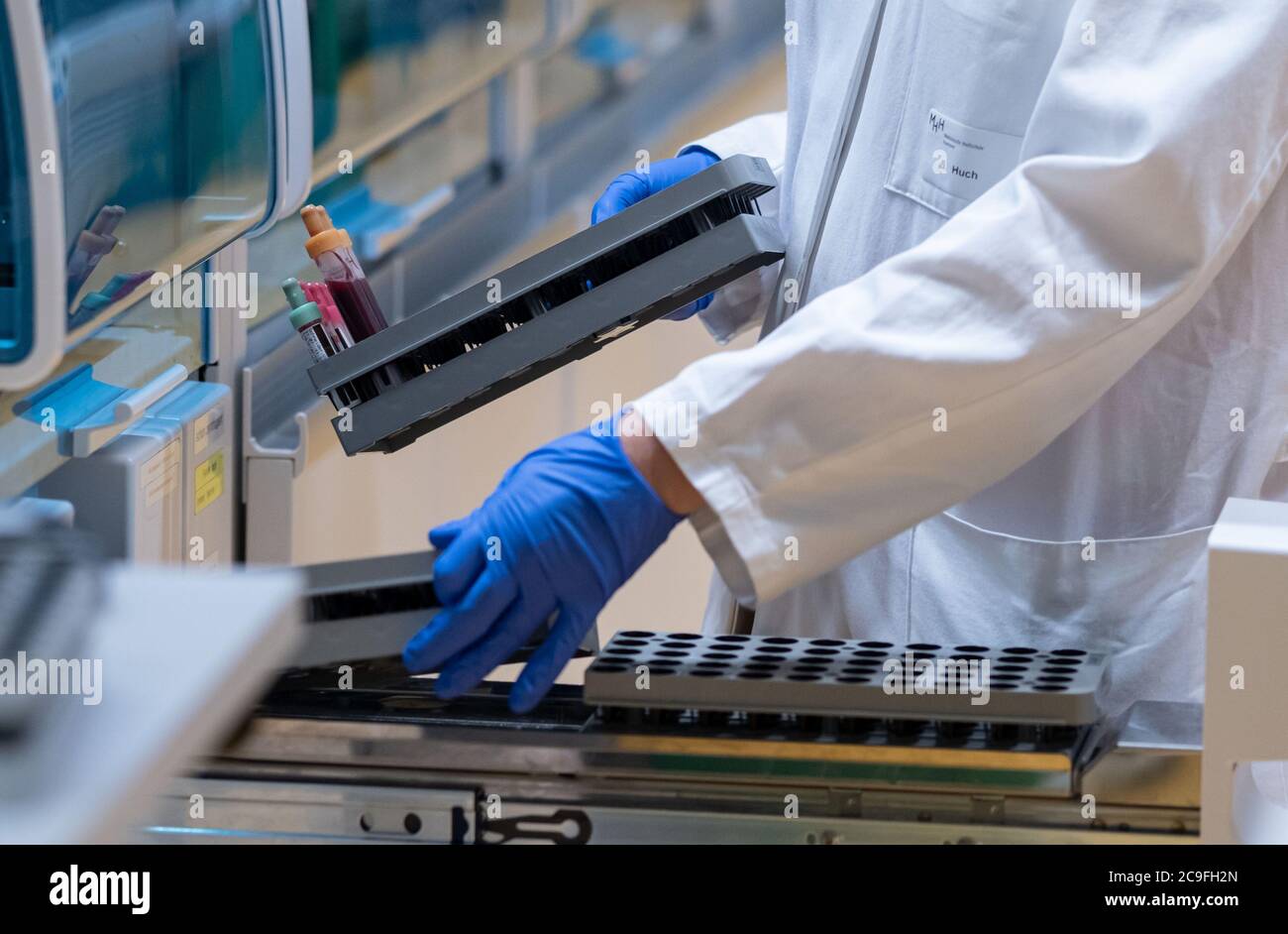 Hanover, Germany. 31st July, 2020. Medical staff work in the laboratory ...