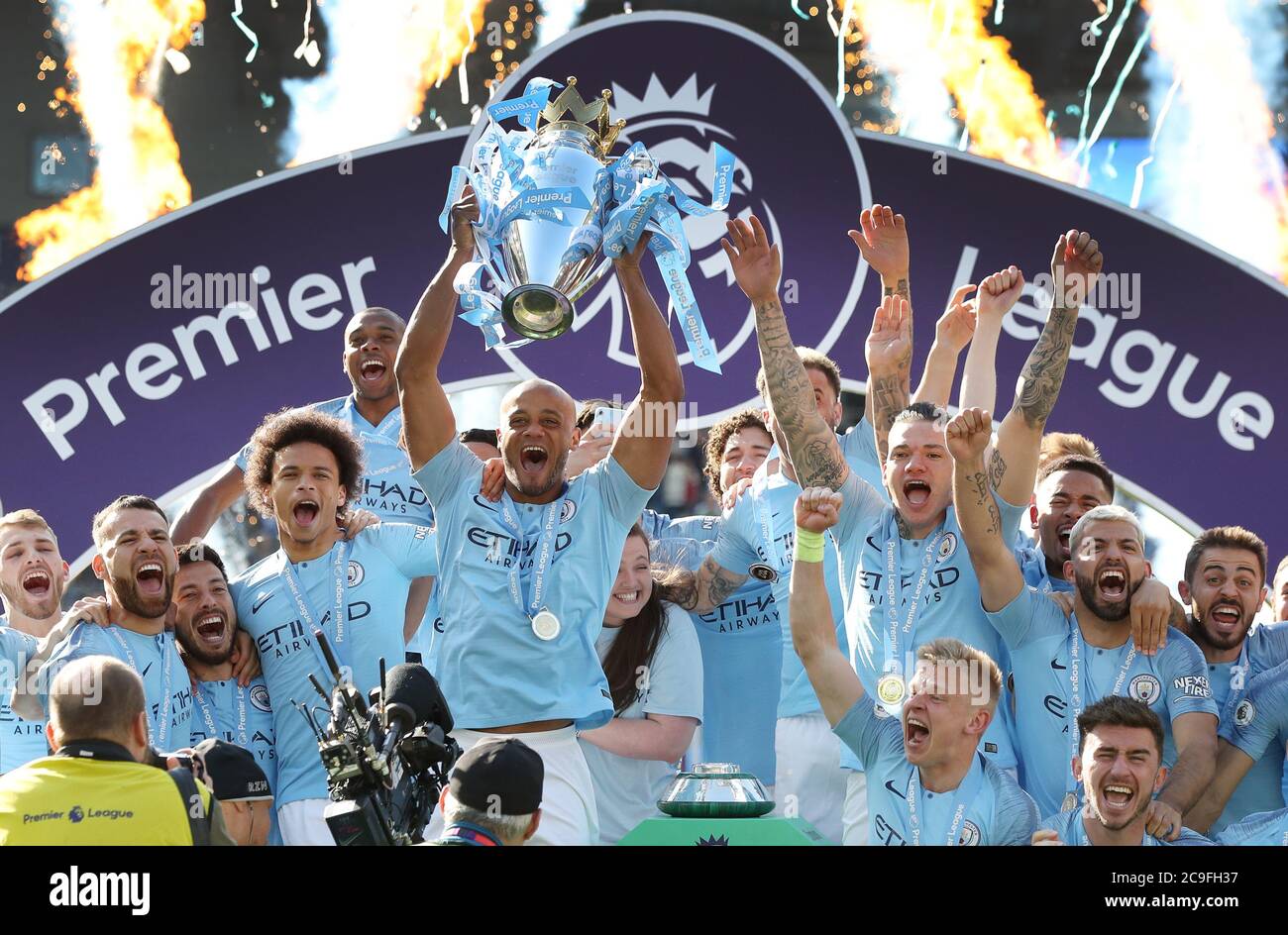 Manchester city captain vincent kompany lifts premier league trophy hi ...