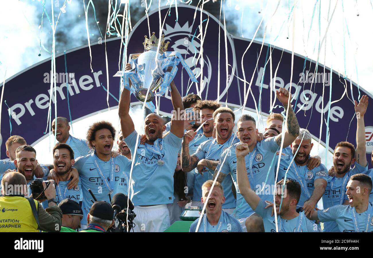 Manchester city captain vincent kompany lifts premier league trophy hi ...