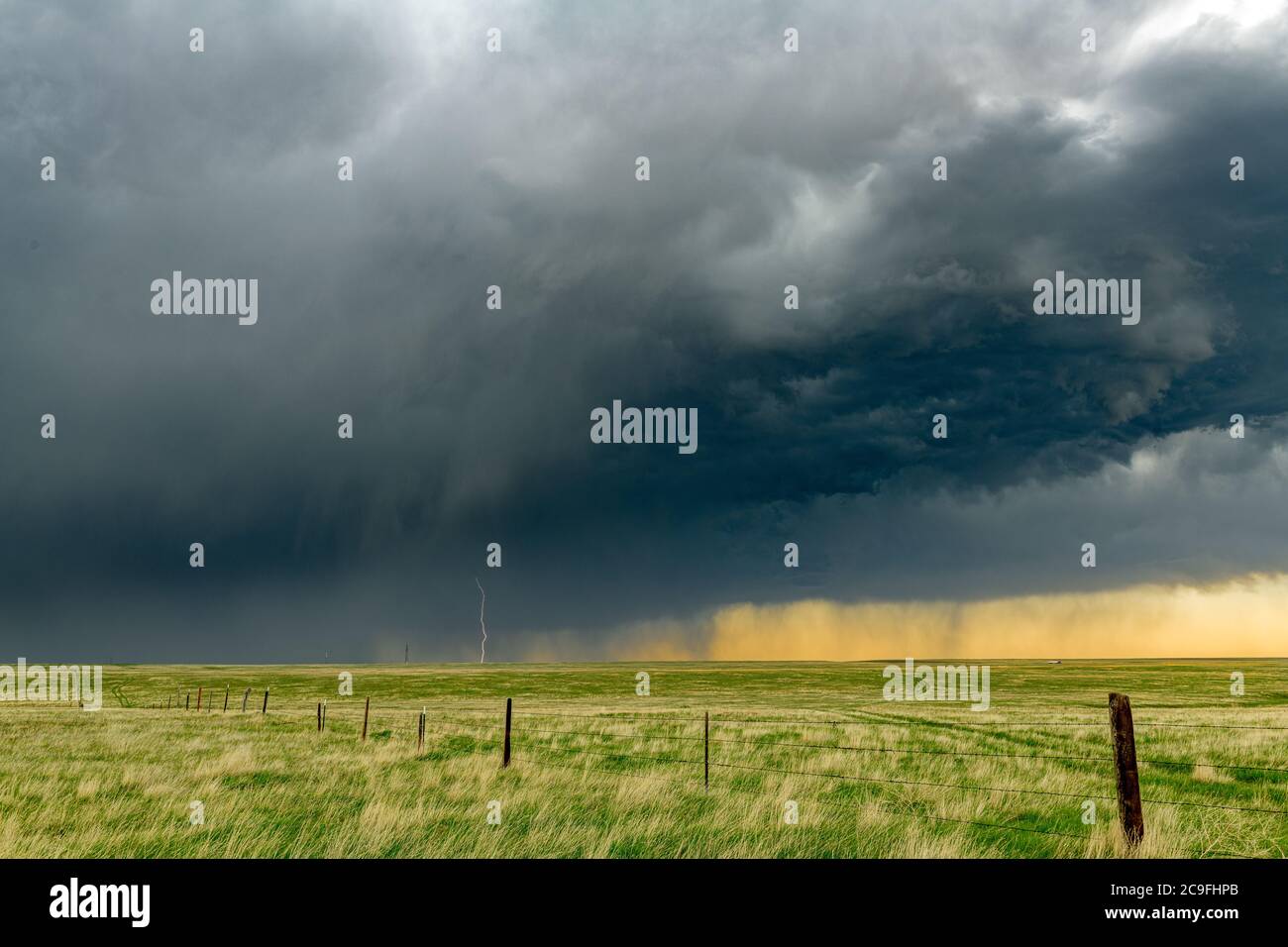 A mesocyclone weather supercell, which is a pre-tornado stage, passes ...