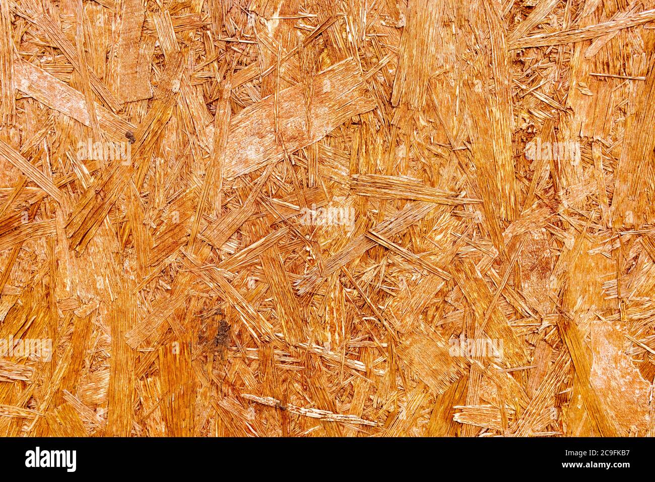 pressed wooden panel background - texture of oriented strand board ...