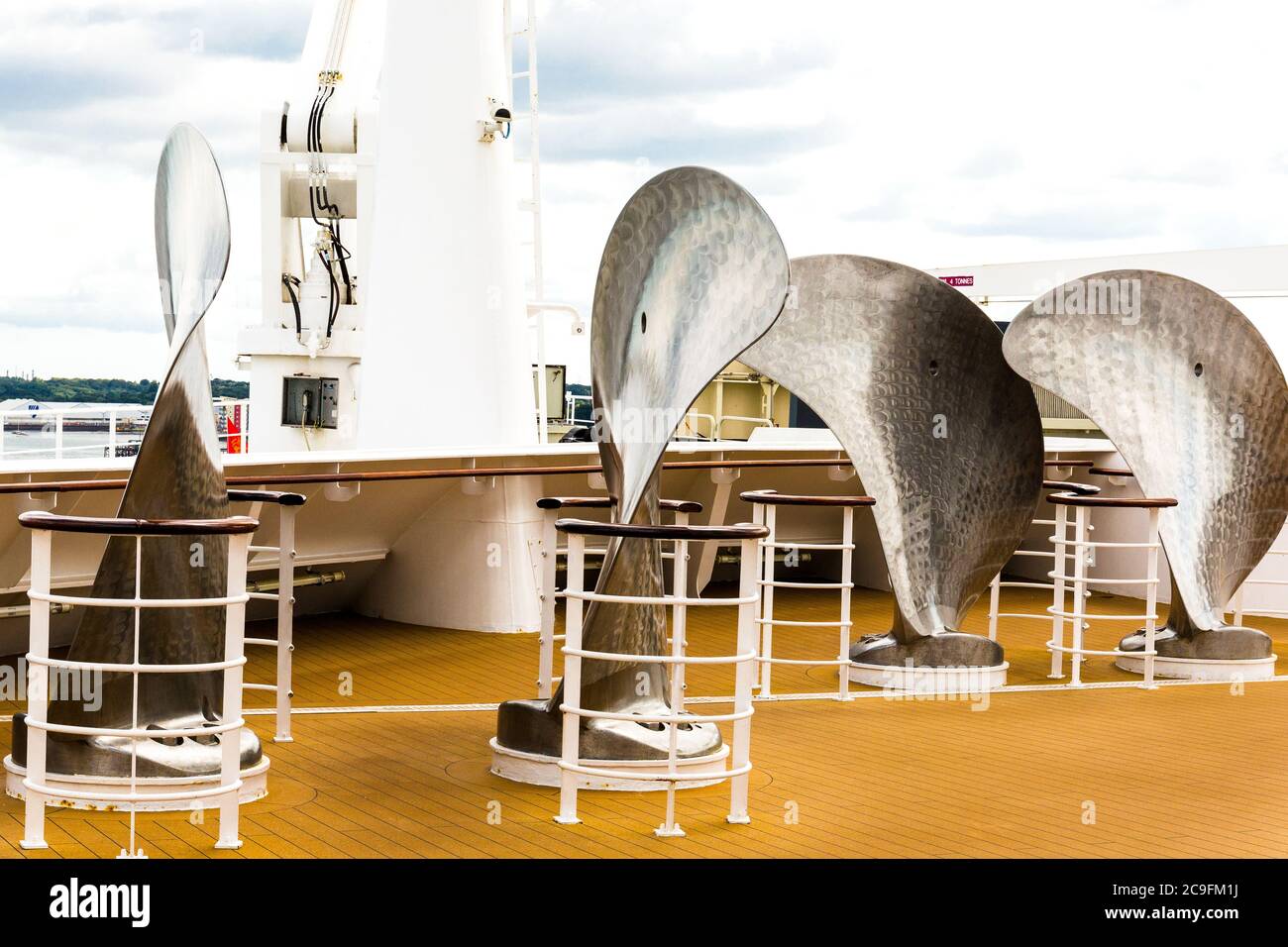 several propeller blades on the bow of the Cunard ship Queen Mary 2 ...