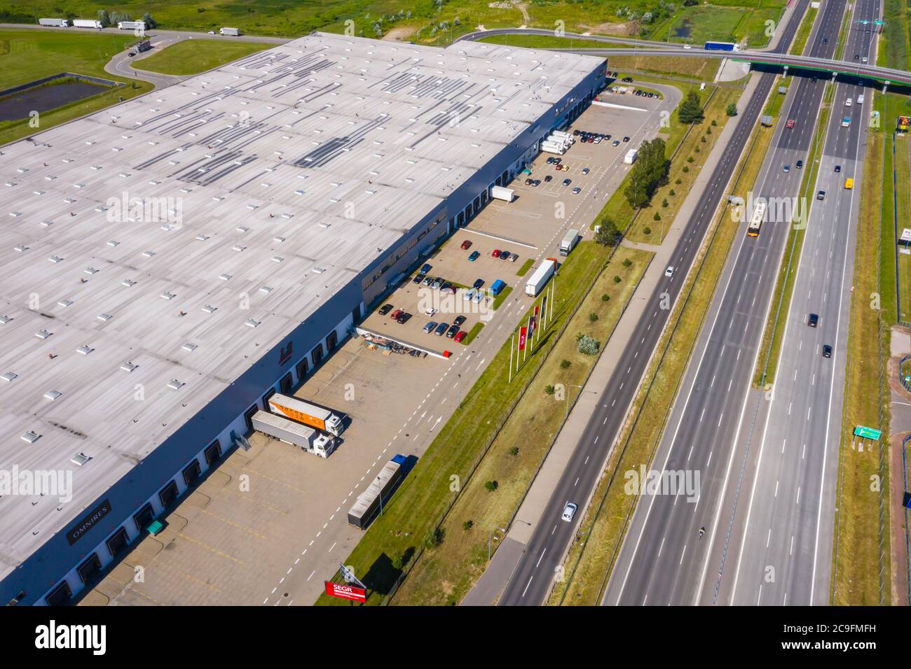 Aerial top view of the large logistics park with warehouse, loading hub ...