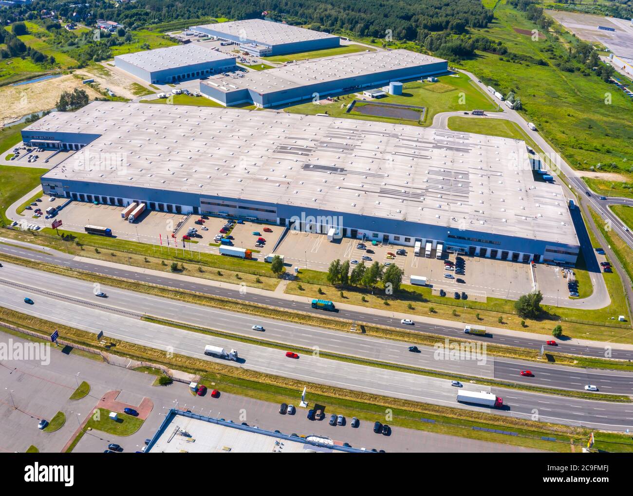 Aerial top view of the large logistics park with warehouse, loading hub ...