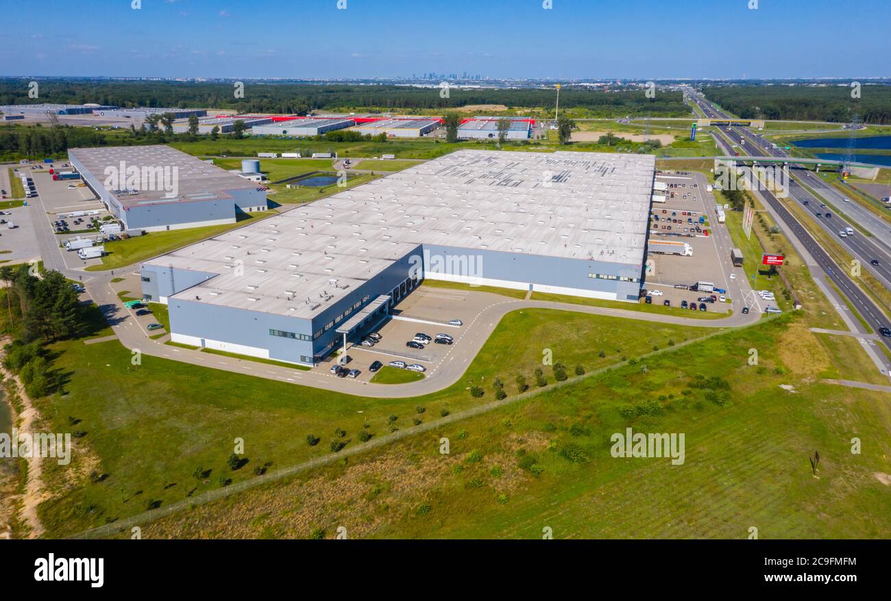Aerial top view of the large logistics park with warehouse, loading hub ...