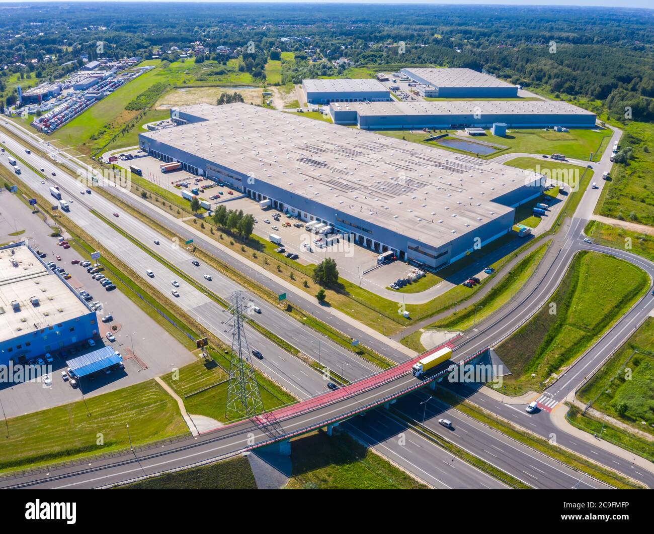 Aerial Shot of Industrial Loading Area where Many Trucks Are Unloading ...