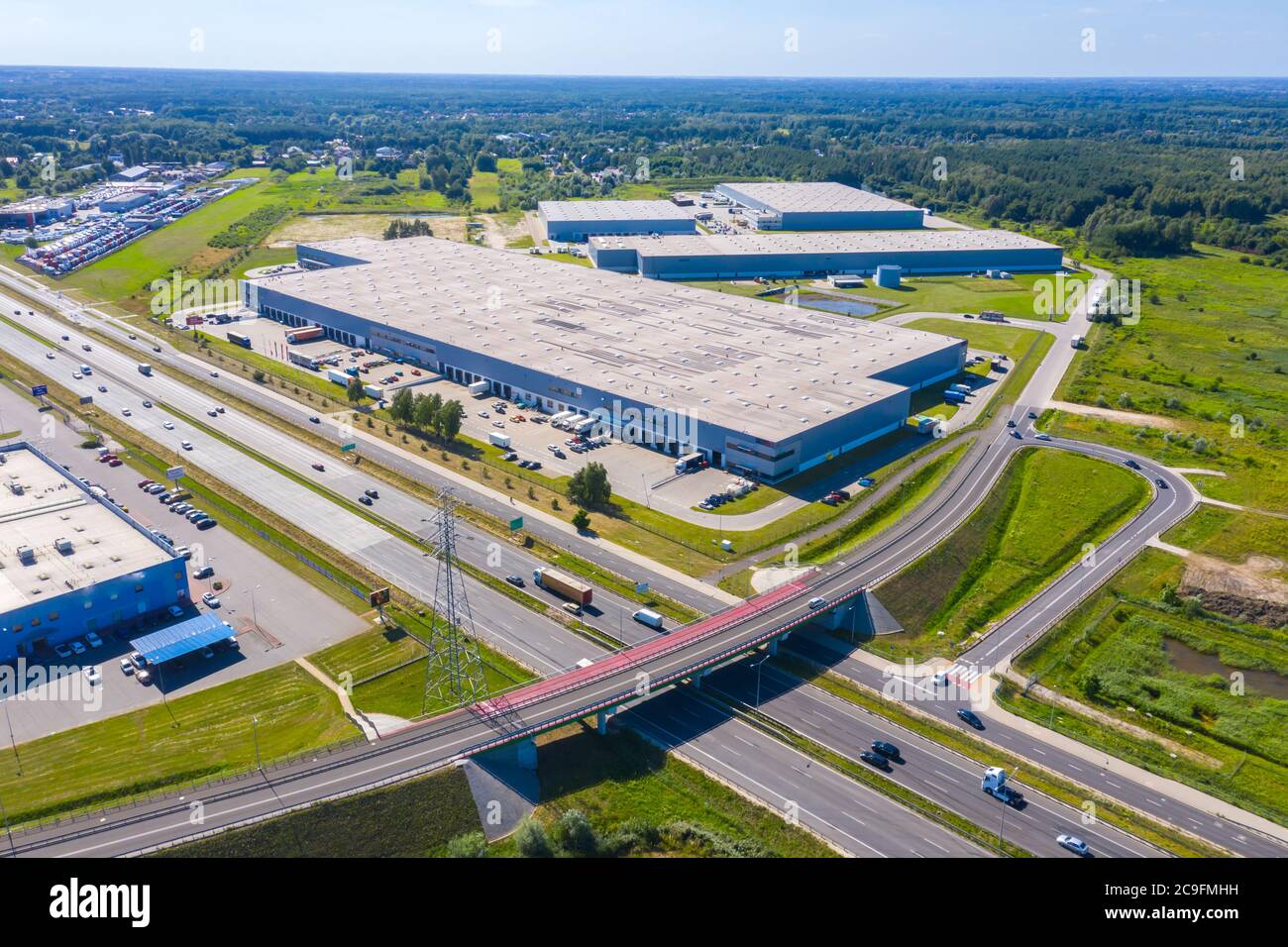 Aerial Shot of Industrial Loading Area where Many Trucks Are Unloading ...