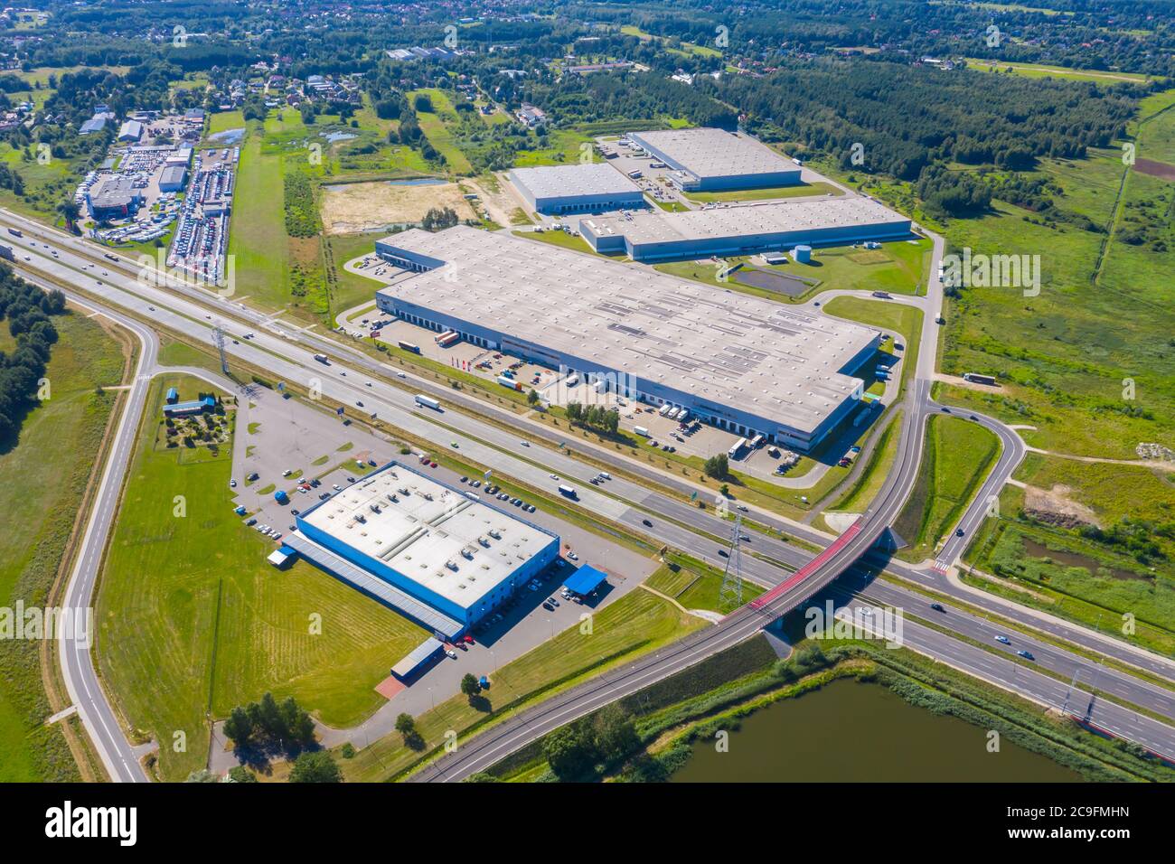 Aerial Shot of Industrial Loading Area where Many Trucks Are Unloading ...