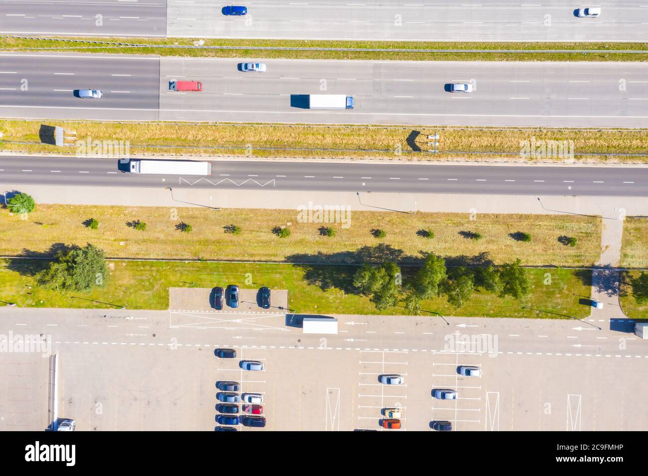 Aerial Shot of Industrial Loading Area where Many Trucks Are Unloading ...