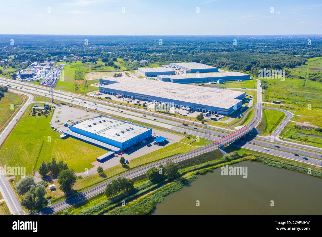 Aerial Shot of Industrial Loading Area where Many Trucks Are Unloading ...
