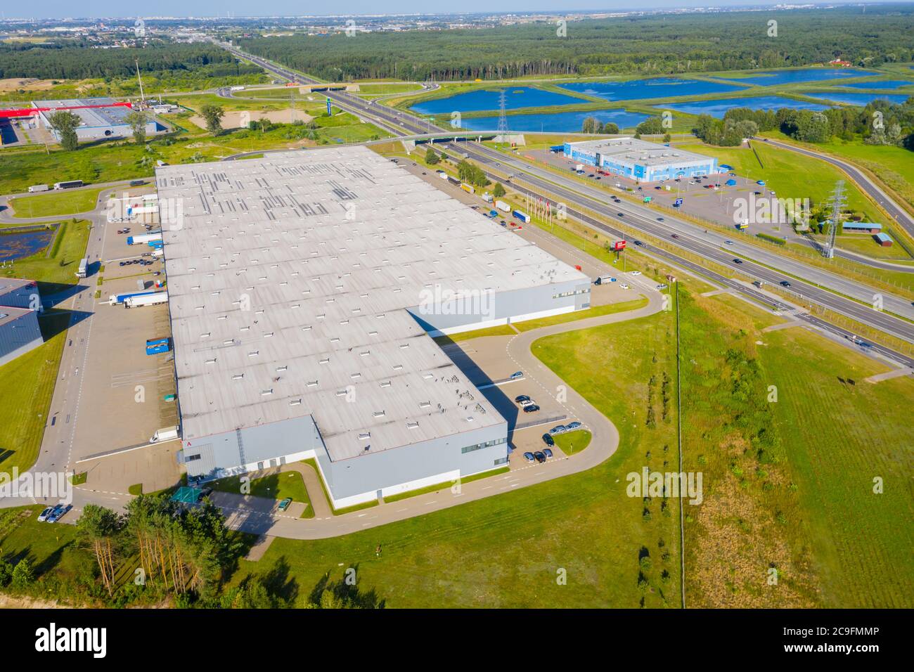 Aerial Top View of Industrial Storage Building Area with Solar Panels ...