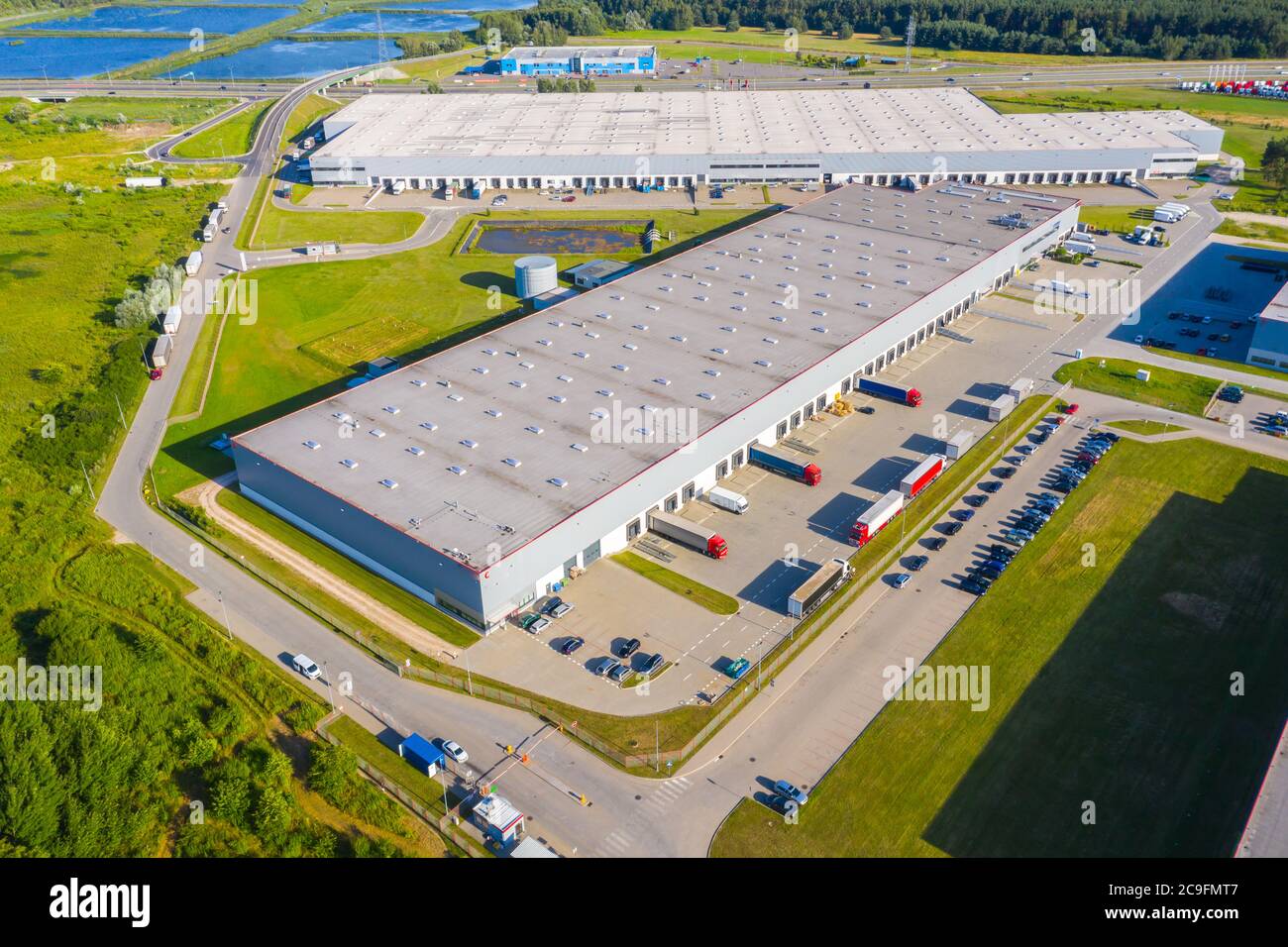 Aerial top view of the large logistics park with warehouse, loading hub ...