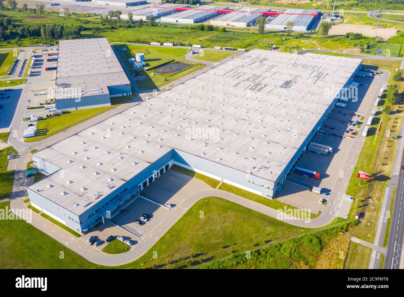 Aerial top view of the large logistics park with warehouse, loading hub ...