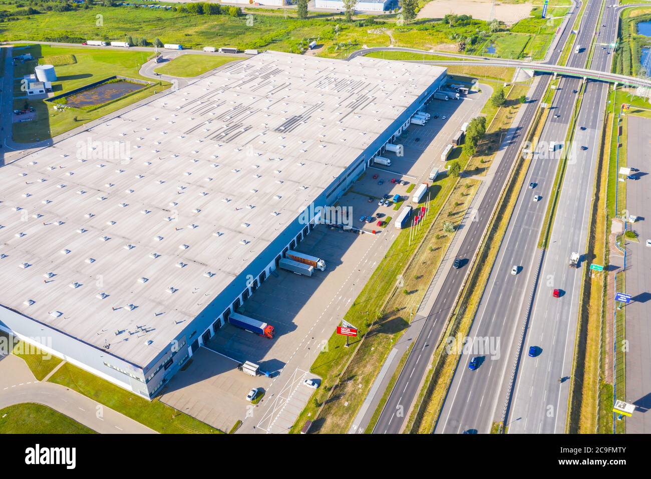 Aerial top view of the large logistics park with warehouse, loading hub ...